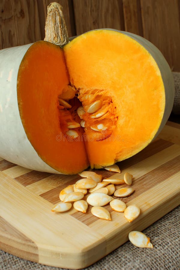 Pumpkin, cut with seeds stock photo. Image of seed, organic - 44954600