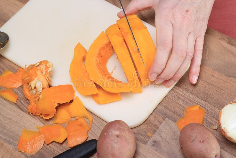 A Pumpkin is Cut to Slices stock image. Image of fresh - 29031485