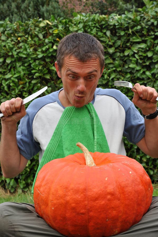 Young Man Eating His Huge Pumpkin Stock Photo - Image of caucasian ...