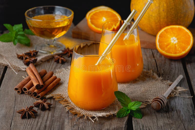 Pumpkin and Orange Spiced Fall Cocktail with Cinnamon Stock Image ...