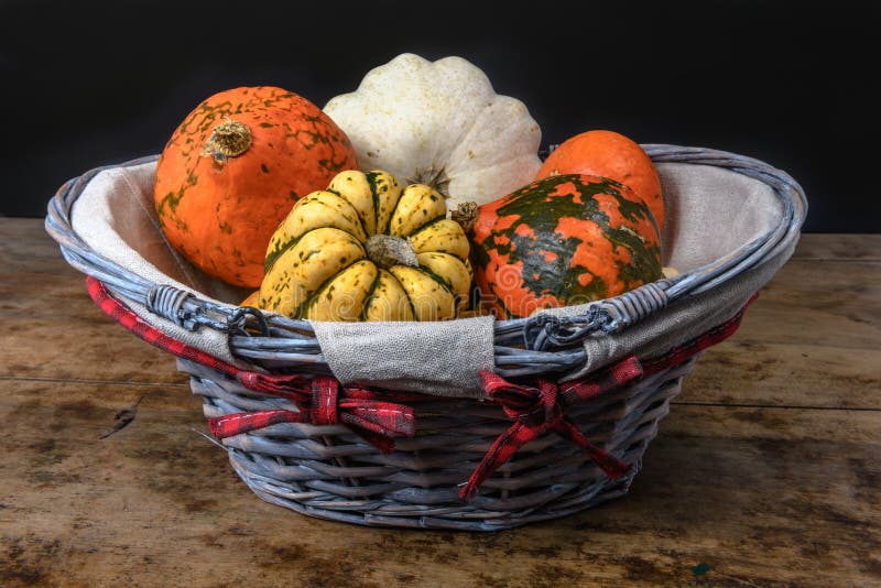 Pumpkin, Patisson and Jack Be Little in a Decorative Basket Stock Photo ...