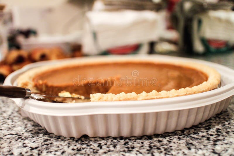 Pumpkin Pie on Kitchen Counter Stock Image - Image of dessert, custom ...