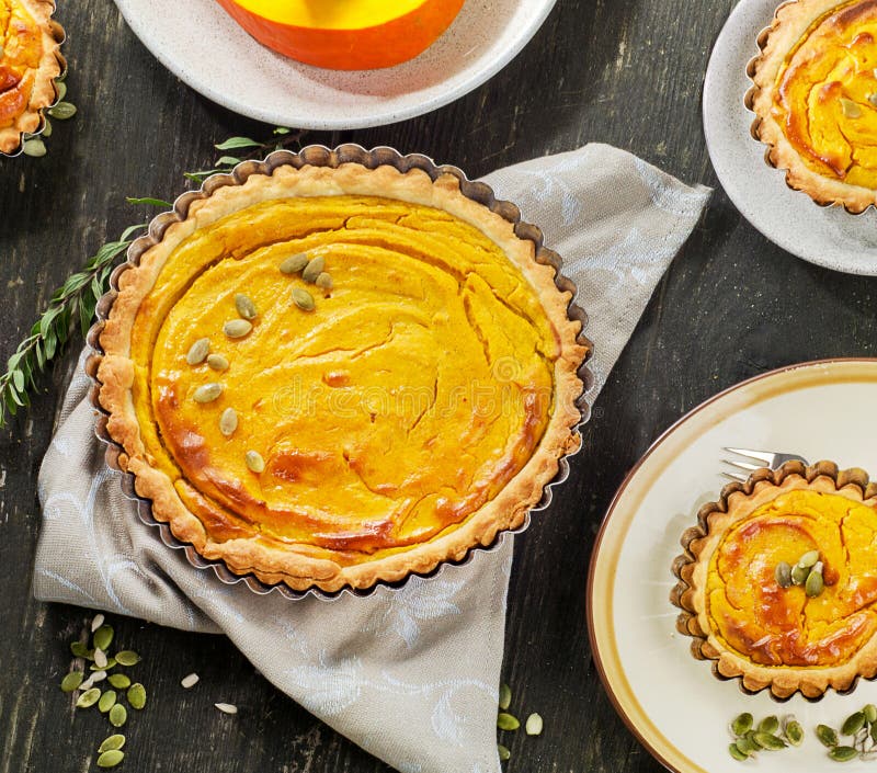 Pumpkin Pie for Thanksgiving on Rustic Background. Stock Photo - Image ...