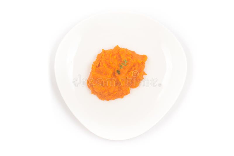 Pumpkin puree on a plate stock photo. Image of puree - 130547304