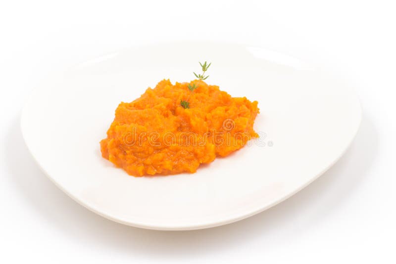 Pumpkin puree on a plate stock image. Image of diet - 130547415
