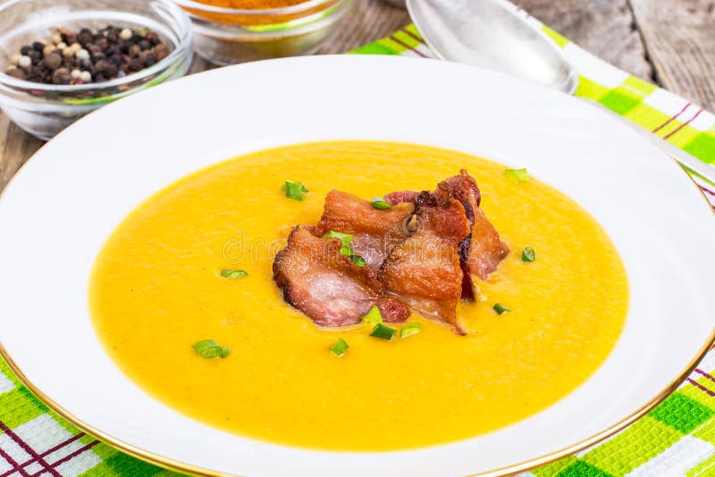 Pumpkin Puree Soup with Bacon Stock Photo - Image of orange, bread ...