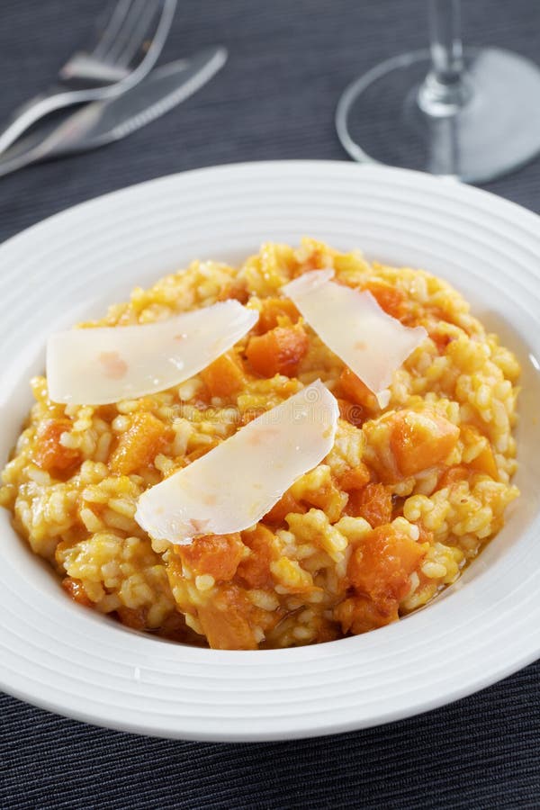 Pumpkin Risotto with Parmesan Cheese Stock Photo - Image of meatless ...