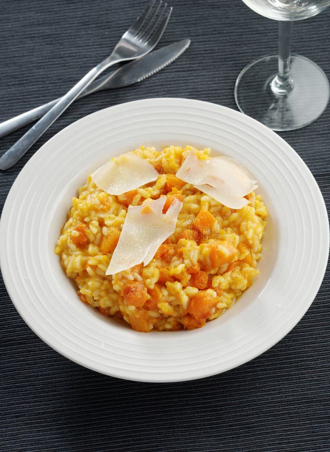 Pumpkin Risotto with Parmesan Cheese Stock Image - Image of knife ...