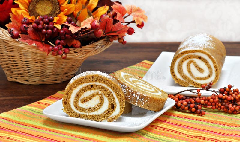 Pumpkin Roll Cake in an Autumn Setting. Stock Photo - Image of powdered ...