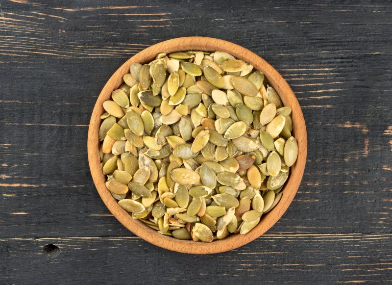 Pumpkin Seed Kernels in Bowl Stock Photo - Image of kernel, cereal ...