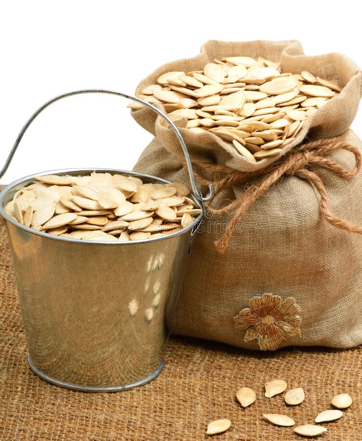 Pumpkin Seeds in the Bag and in Bucket Isolated on White Stock Image ...