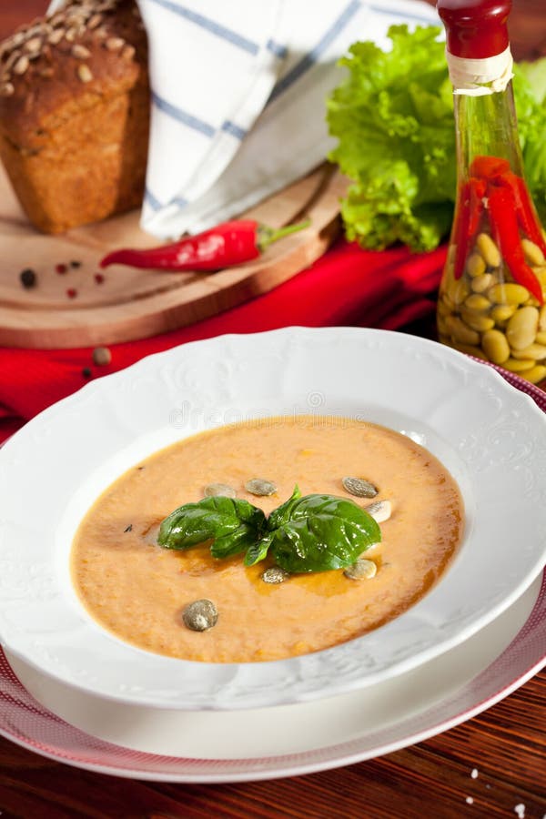 Pumpkin Soup stock image. Image of plate, basil, meal - 44565795