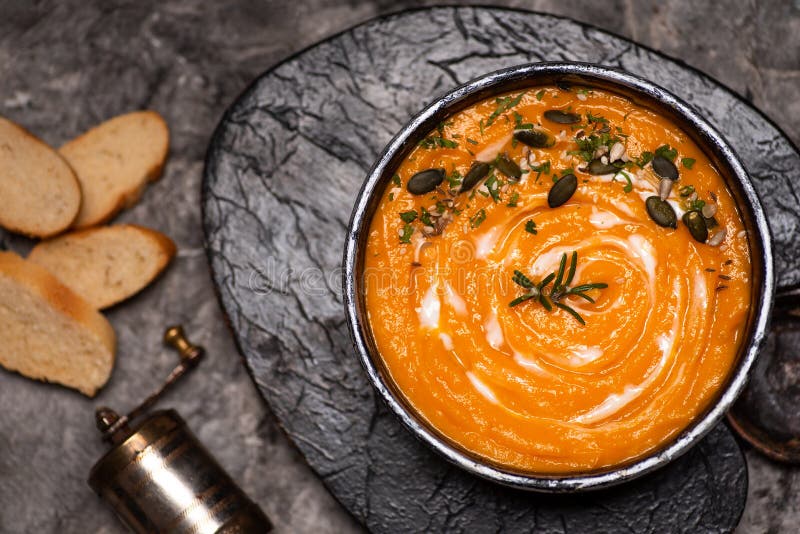 Pumpkin Soup on a Rustic Setup Stock Photo - Image of bowl, lunch ...