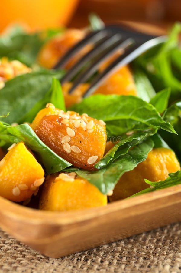 Pumpkin and Spinach Salad stock image. Image of season - 21589045