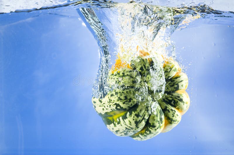 Pumpkin in water stock photo. Image of circle, splashing - 10938734