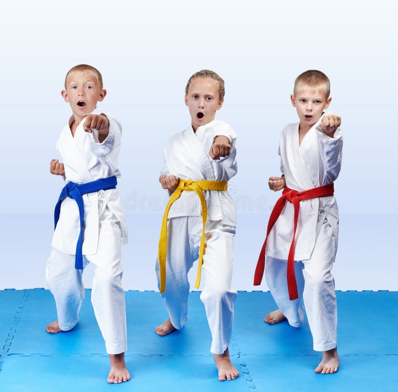 Punch Hand are Hitting Three Karateka Stock Image - Image of ...