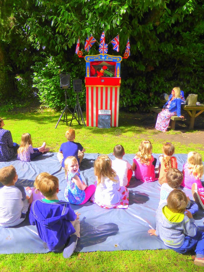 Puppet show on grass lawn editorial photography. Image of show - 60152432