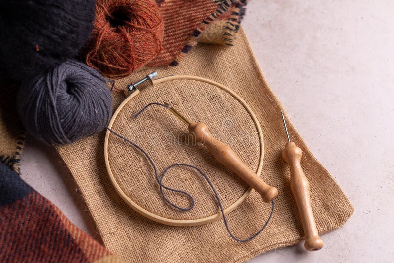 Punch Needle Tool Composition with a Burlap Fabric in a Embroidery Hoop ...
