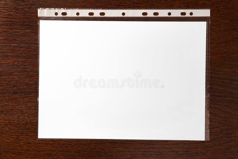 Punched Pocket with Paper Sheet on Wooden Table, Top View Stock Photo ...