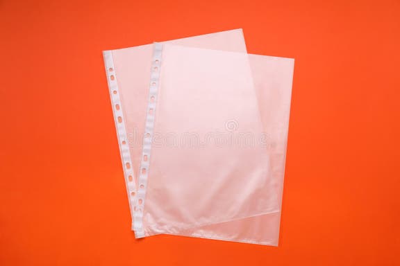 Punched Pockets on Orange Background, Flat Lay Stock Photo - Image of ...