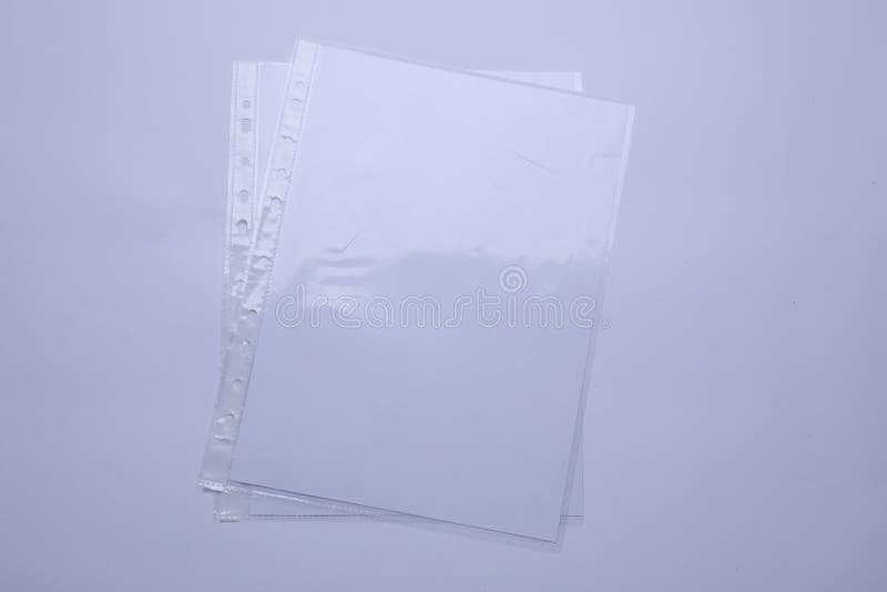 Punched Pockets with Paper Sheets Isolated on White, Top View Stock ...