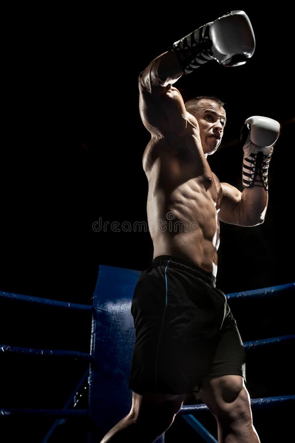 Punching Boxer on Boxing Ring Stock Photo - Image of fighting, boxer ...