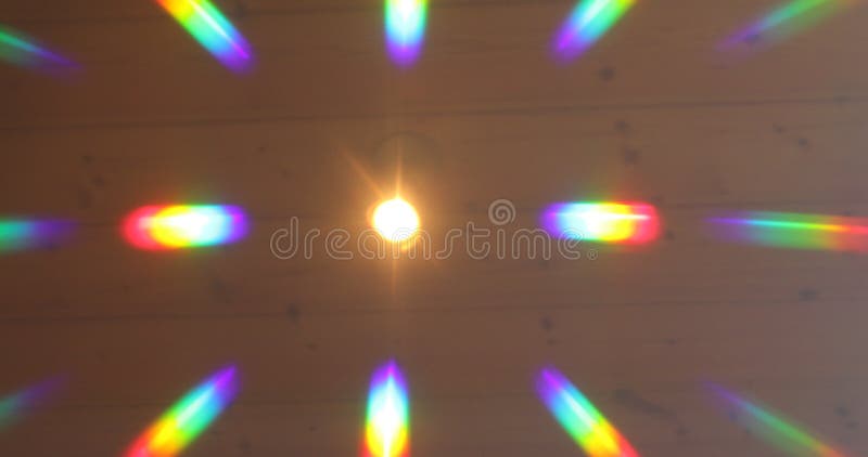 The Light Source Creates Golden Particles that Fall Onto the Colorful ...