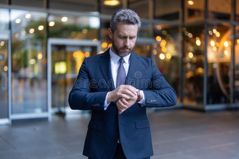 Punctual Businessman Checking Time Outdoor. Business Deadline ... Punctual Businessman Checking Time Outdoor. Business Deadline ...