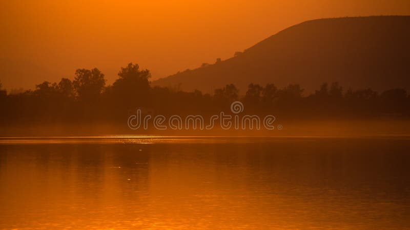 The Beautiful Sunset Rays in the Lake of Pune. Stock Image - Image of ...