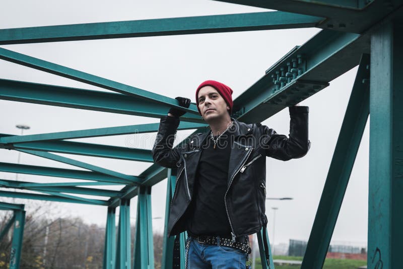 Punk Guy Standing on a Bridge Stock Photo - Image of male, alternative ...