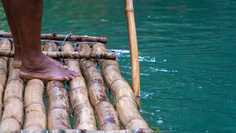 Punting Down a River on a Bamboo Raft Stock Photo - Image of fish, lake ...