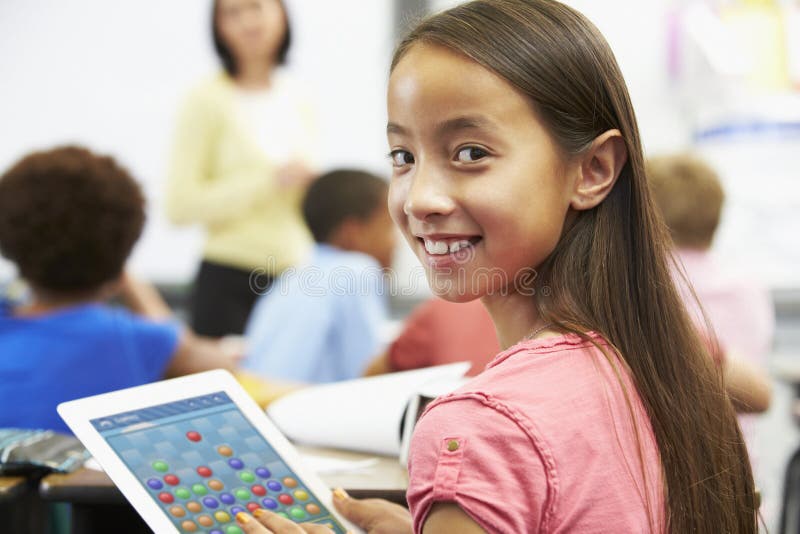 Pupil in Class Playing a Game on a Tablet Stock Photo - Image of ...