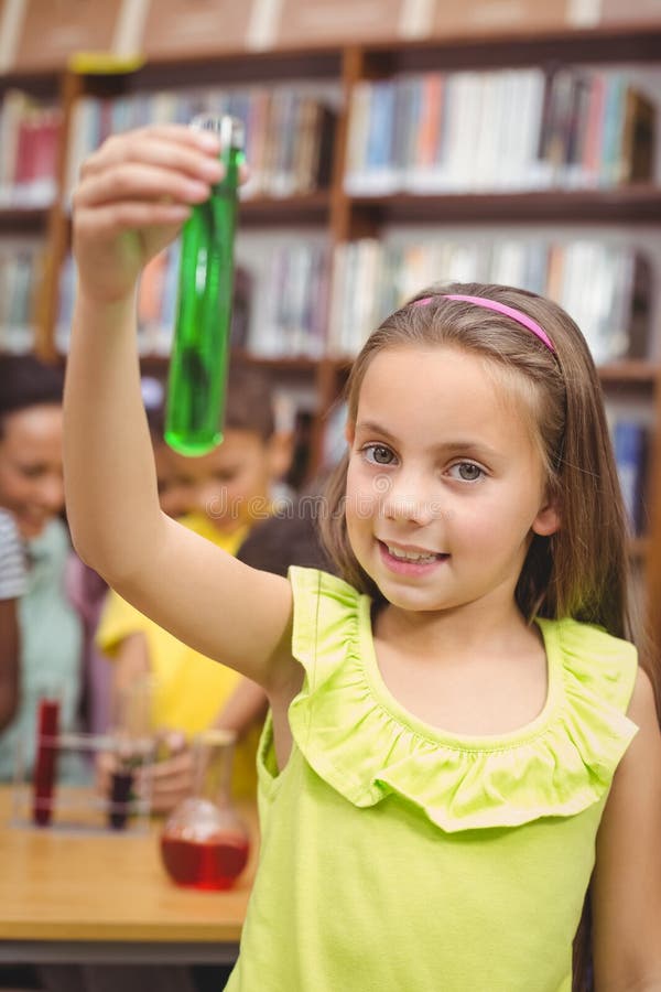 Pupil Doing Science in Library Stock Photo - Image of back, child: 58138408