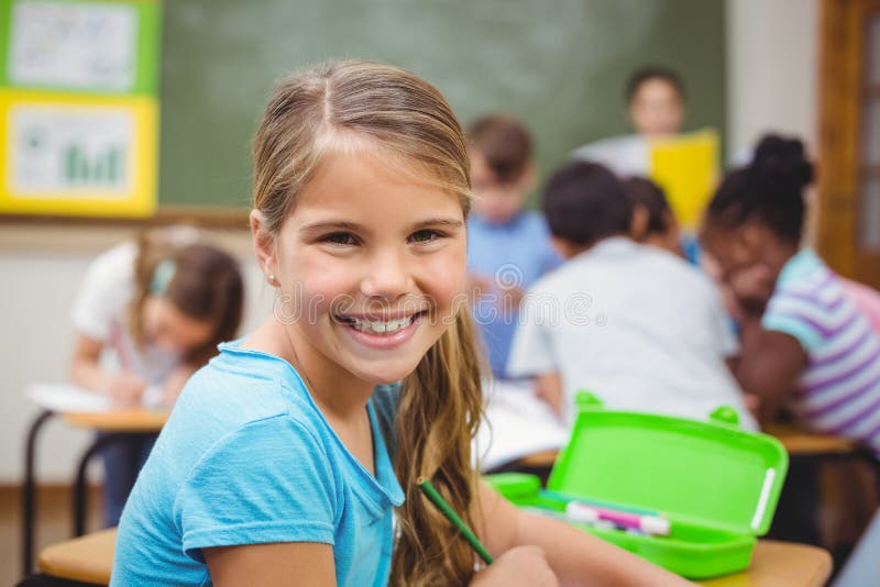 Pupil Smiling at Camera in Classroom Stock Image - Image of academic ...