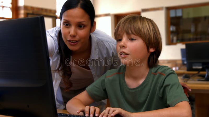 Pupil and Teacher in Computer Class at School Stock Video - Video of ...