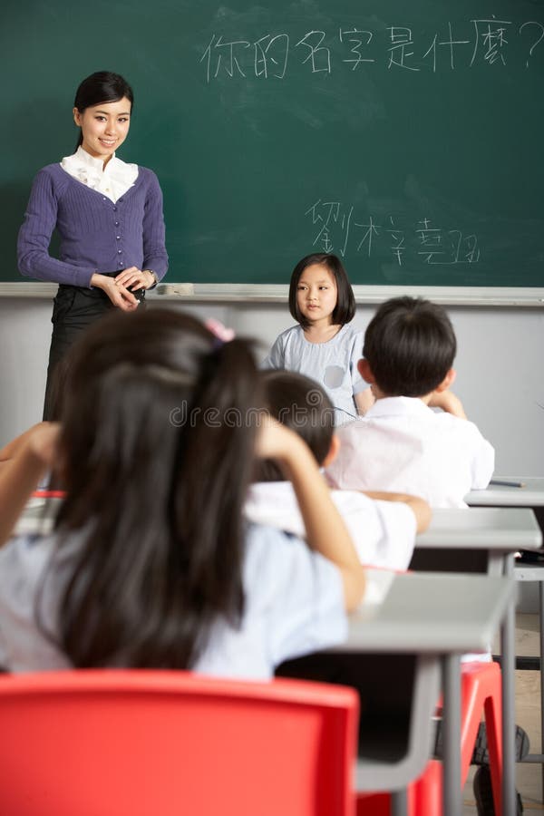 Pupil and Teacher Standing in a Chinese School Stock Photo - Image of ...