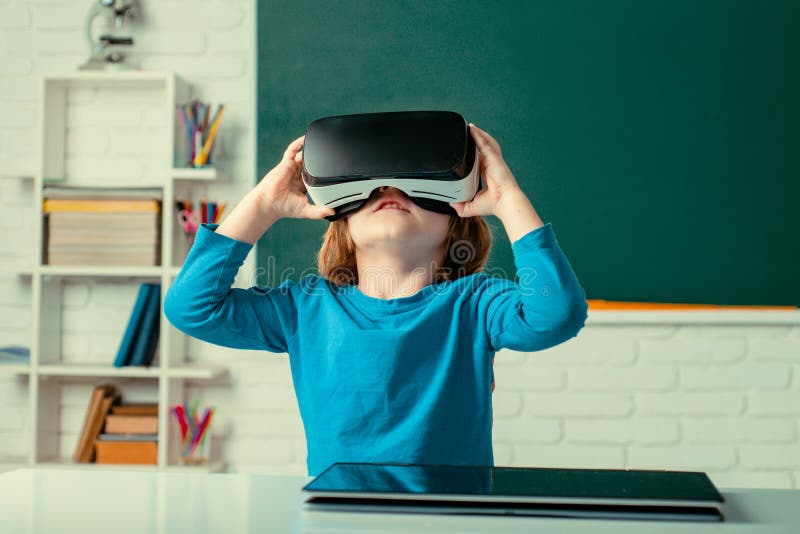 Pupil with Vr Goggles in School Classroom. Little Boy Playing with VR ...