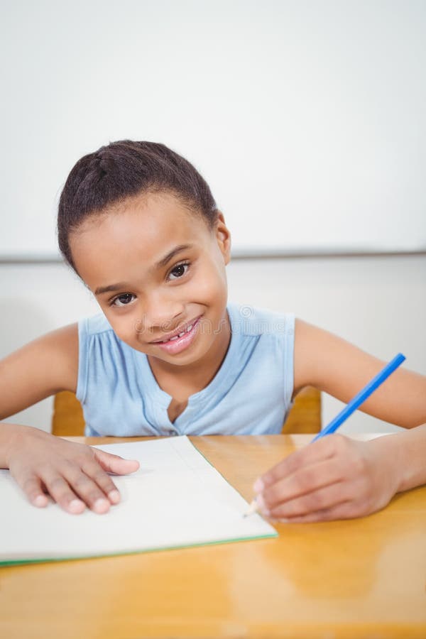 Pupil Writing into a Notebook Stock Photo - Image of notepad, person ...