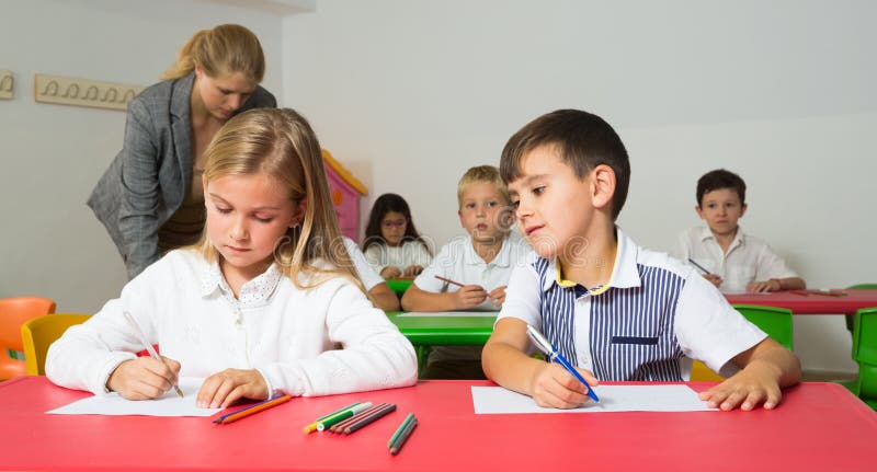 Pupils Chattering at Lesson Stock Image - Image of occupation, notebook ...