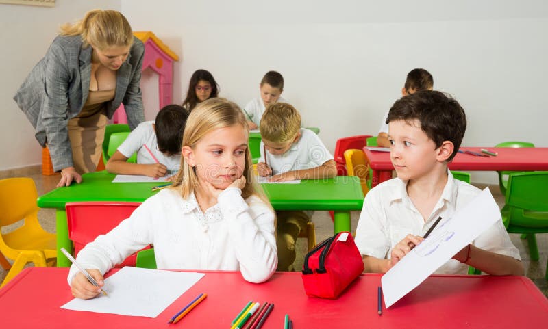 Pupils Chattering at Lesson Stock Photo - Image of fellow, classmate ...