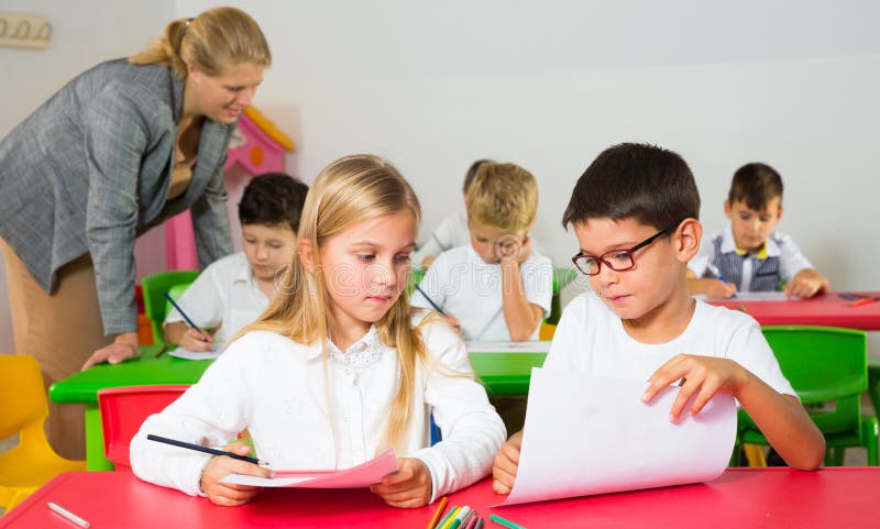 Pupils Chattering at Lesson Stock Image - Image of activity, girl ...