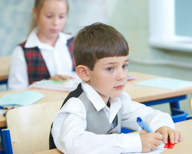 Pupils in a class stock photo. Image of school, desk, book - 4462950