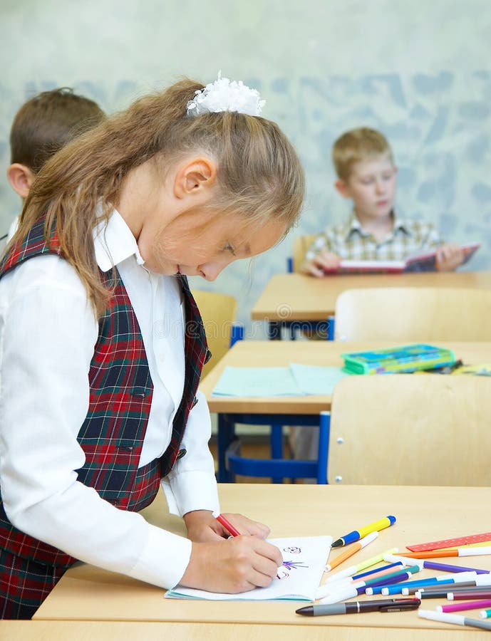 Pupils in a class stock photo. Image of school, desk, book - 4462950