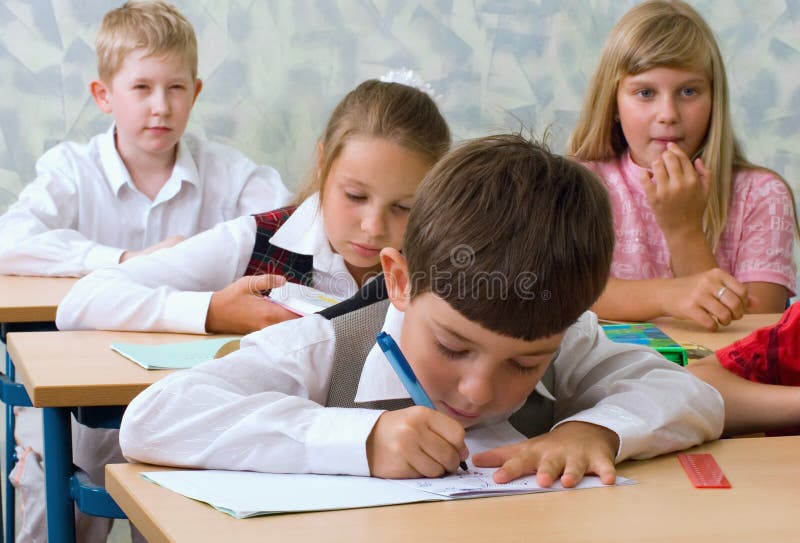 Pupils at classroom stock image. Image of desk, sitting - 6037819