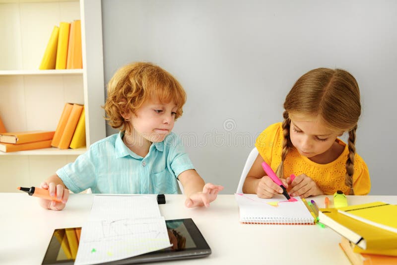 Pupils Studying in Elementary School Stock Photo - Image of device ...