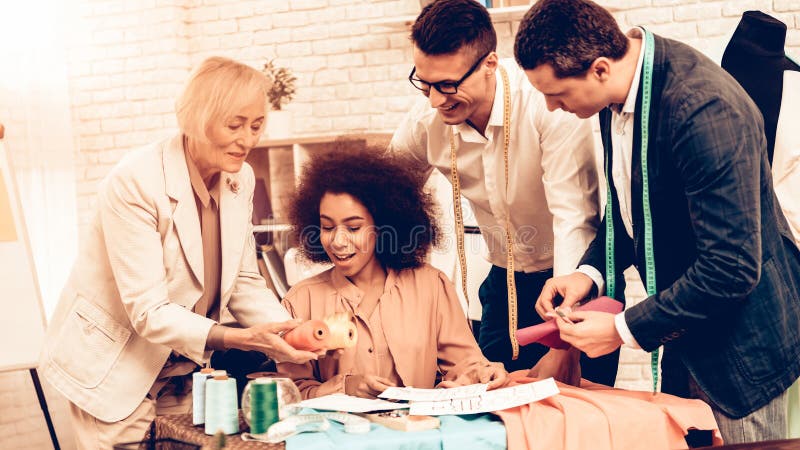Pupils Studying a Sewing in Classroom Stock Photo - Image of male ...