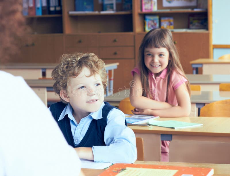 Pupils and Teacher in Classroom in the Elementary School. Beginning of ...