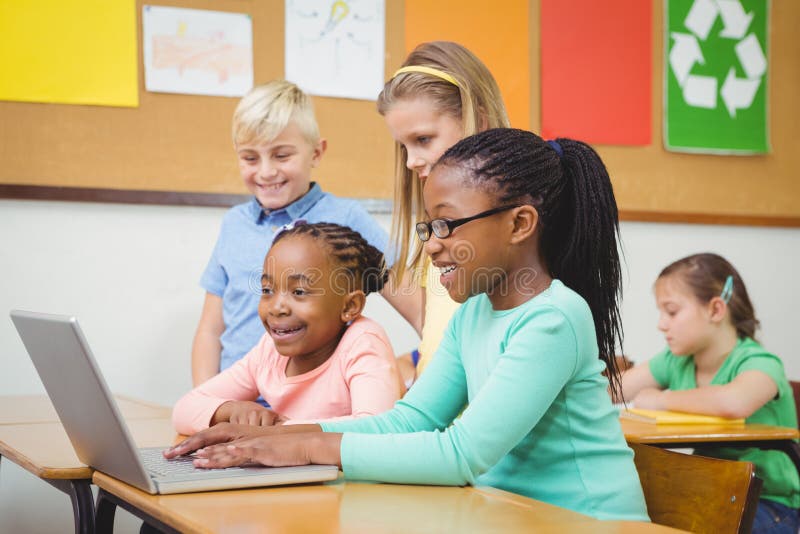 Pupils Using a Laptop in Class Stock Photo - Image of female, academic ...