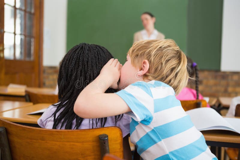 Whispering in Class stock photo. Image of girl, gossip - 16612222