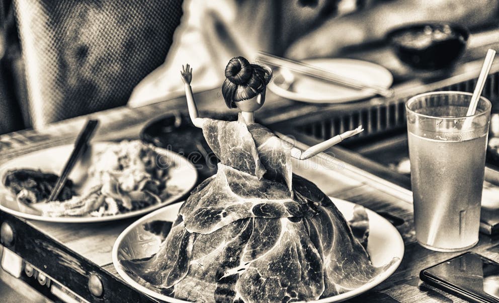 Puppet Dancer Surrounded by Ham, Appetizers on the Table Stock Image ...